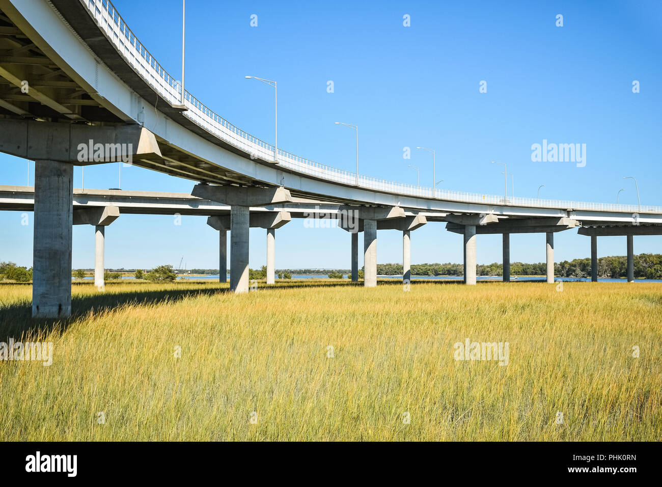Long raised concrete bridge crossing a marsh Stock Photo - Alamy