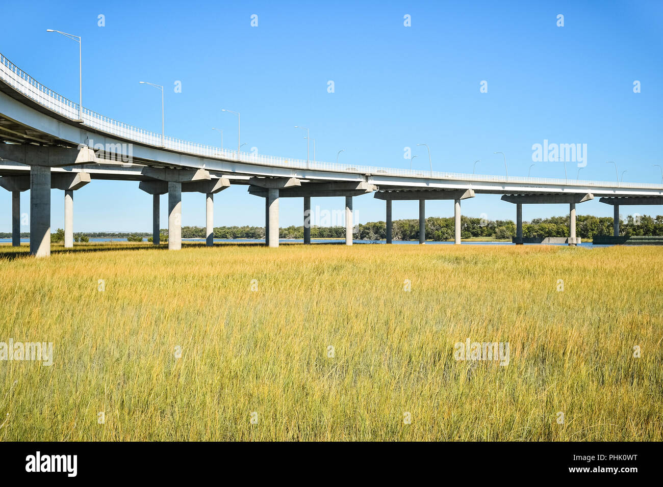 Long raised concrete bridge crossing a marsh Stock Photo - Alamy