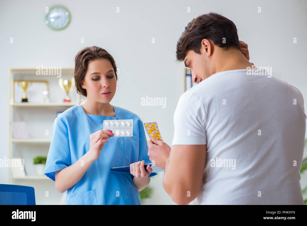 Patient visiting doctor for annual regular check-up in hospital Stock ...