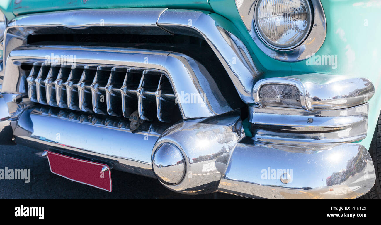 Close up view of a 1957 Chevy shiny chrome front bumper Stock Photo - Alamy