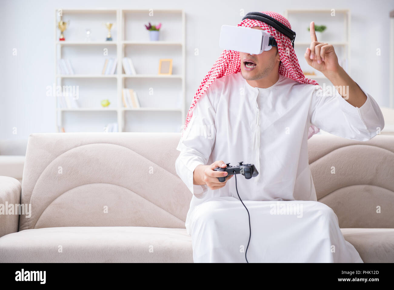Arab man addicted to video games Stock Photo - Alamy