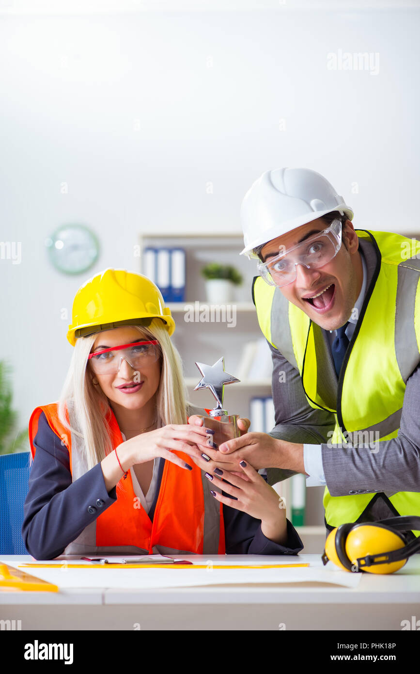 Construction workers having discussion in office before starting Stock ...