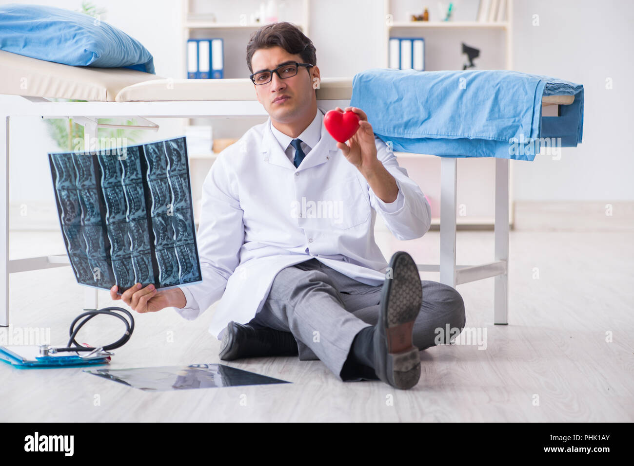 Cardiologist frustrated after unsuccessful surgery Stock Photo - Alamy