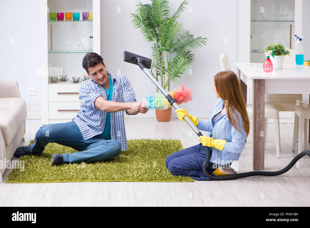 Couple fighting cleaning hi-res stock photography and images - Alamy