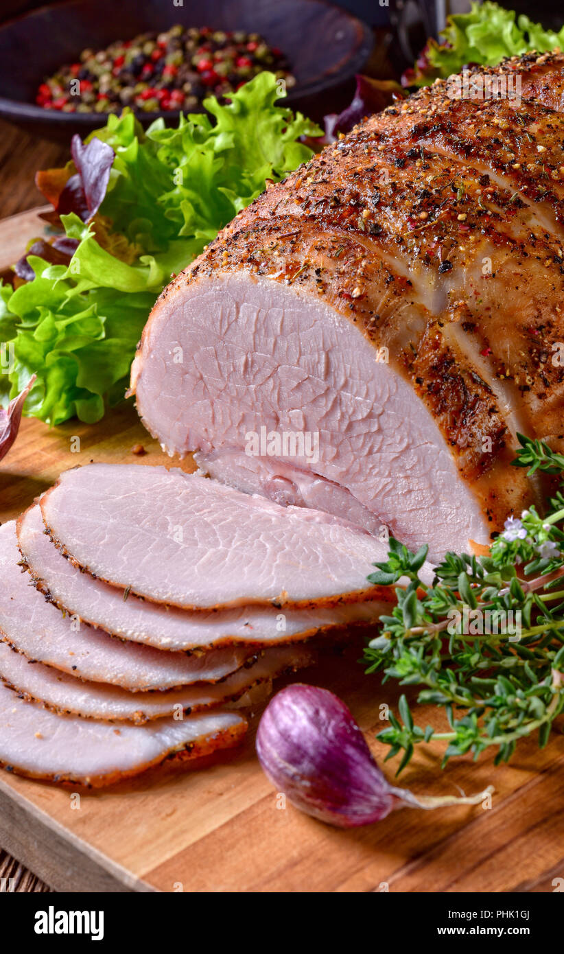 cooked ham with colorful pfefer Stock Photo - Alamy