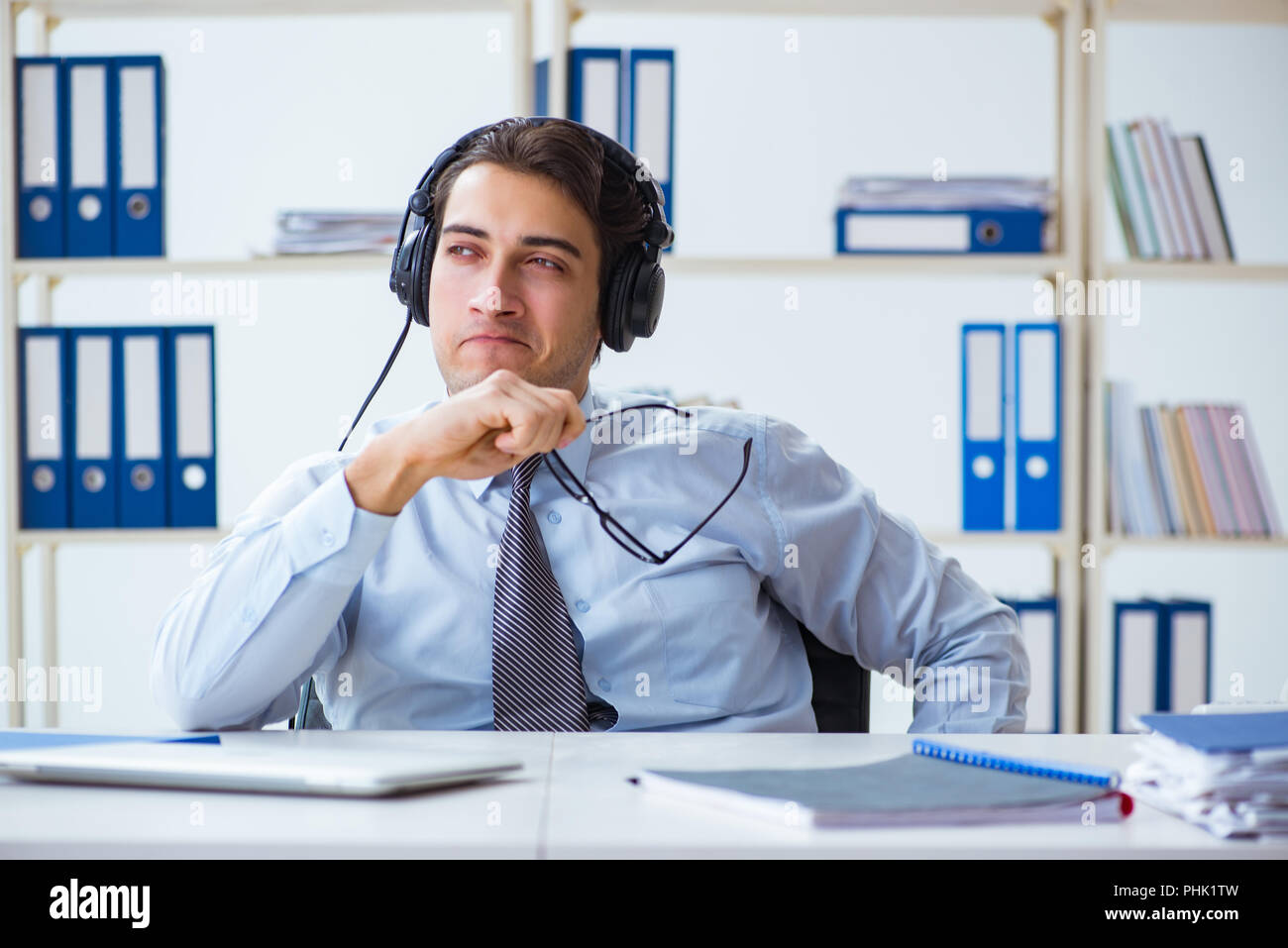 Call center operator talking to customer on live call Stock Photo - Alamy