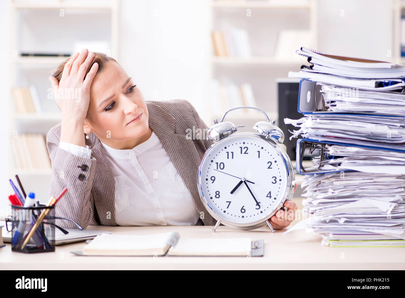 Businesswoman workaholic trying finish hi-res stock photography and ...