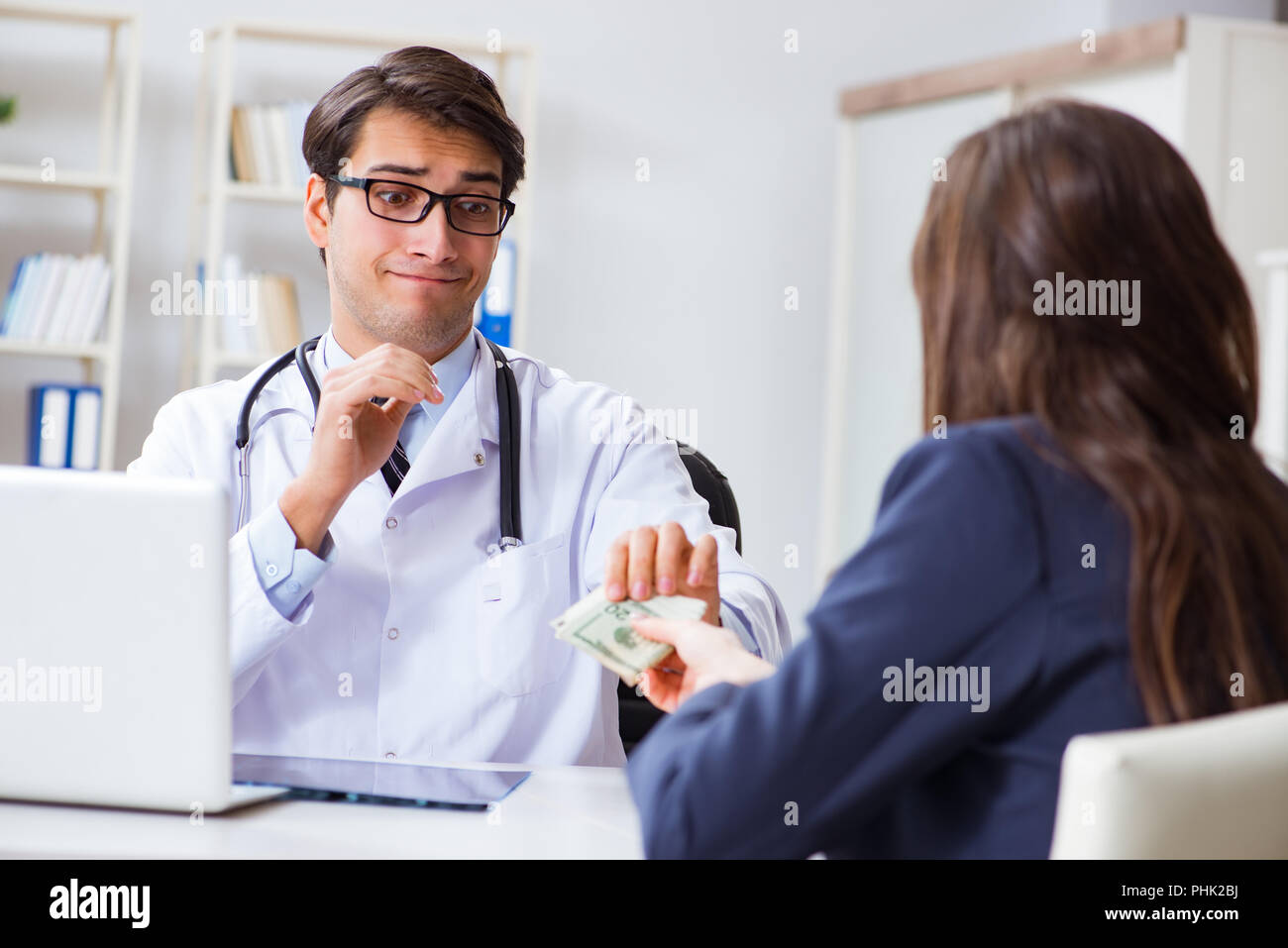 Corrupt doctor taking bribe hi-res stock photography and images - Alamy