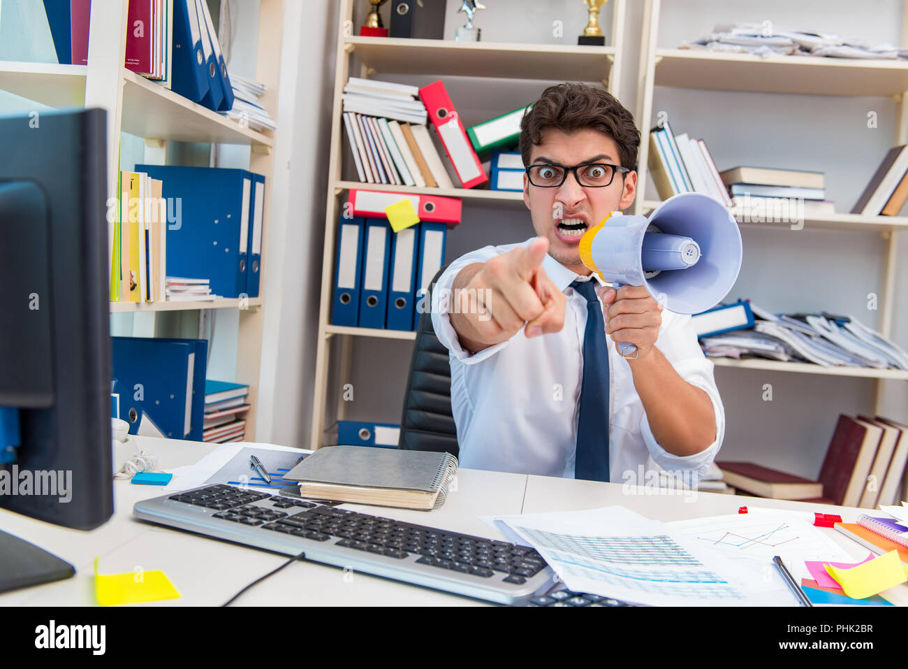 Busy frustrated businessman angry in the office Stock Photo - Alamy