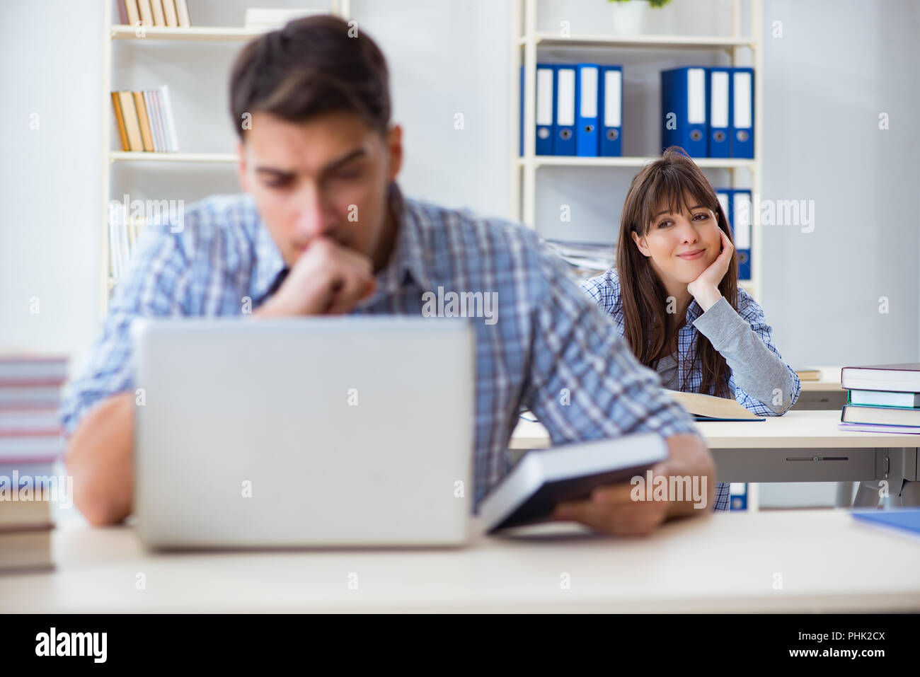 Students sitting and studying in classroom college Stock Photo - Alamy