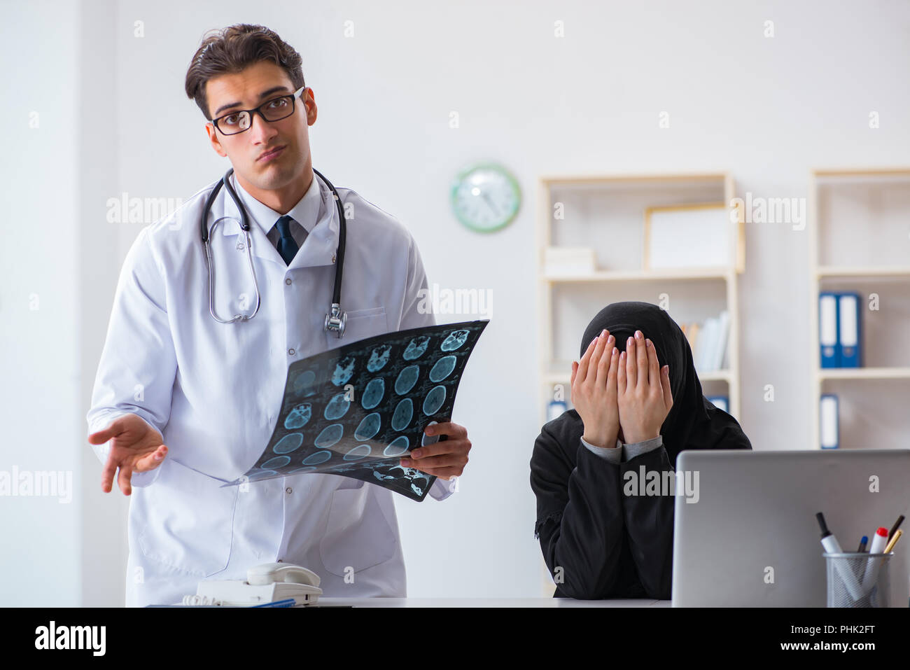 Muslim woman visiting doctor for regular check-up Stock Photo - Alamy