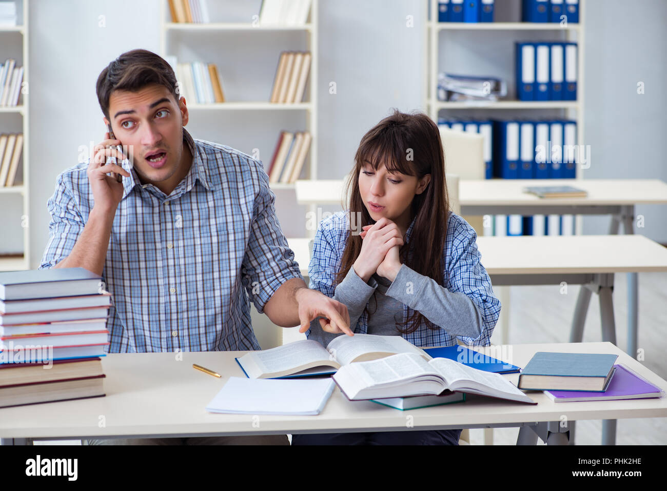 Students sitting and studying in classroom college Stock Photo - Alamy
