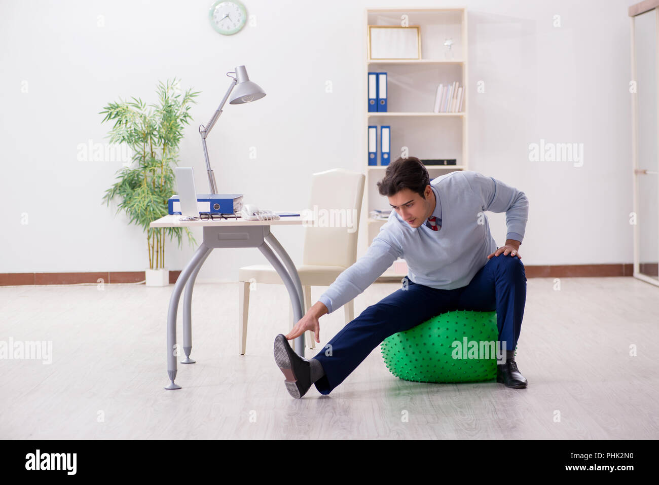 Stretching during lunch break hi-res stock photography and images - Alamy