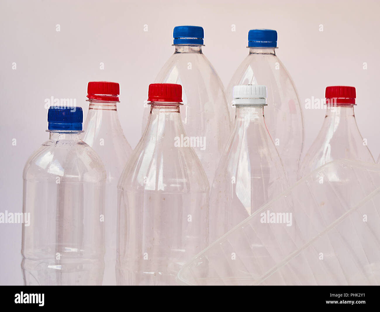 Empty plastic drinking bottles ready for recycling. Environmental ...