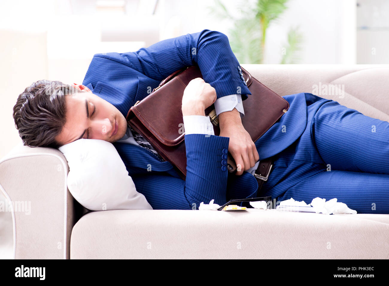 Sick employee staying at home suffering from flue Stock Photo - Alamy