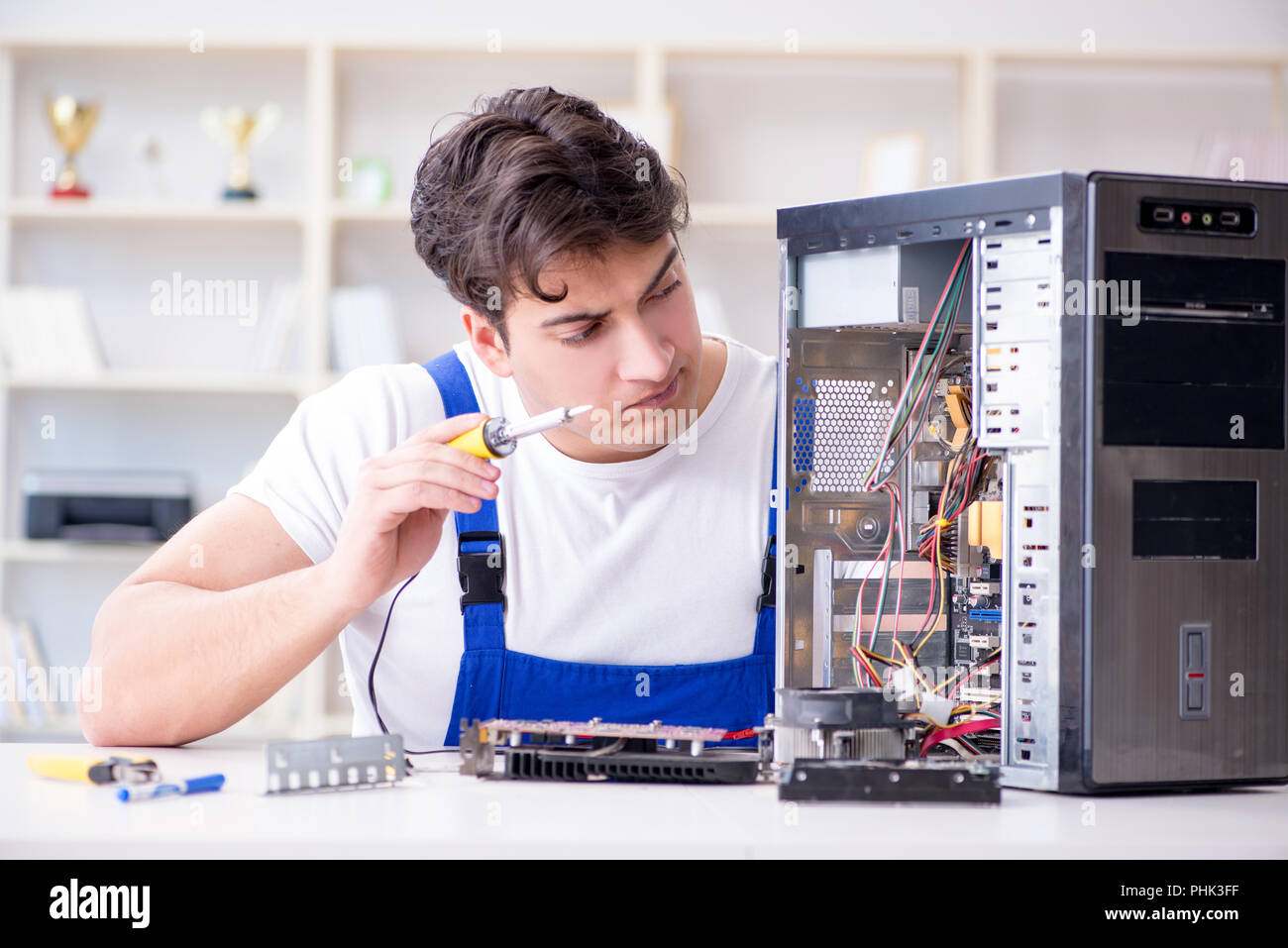 Computer hardware repair and fixing concept by experienced techn Stock ...