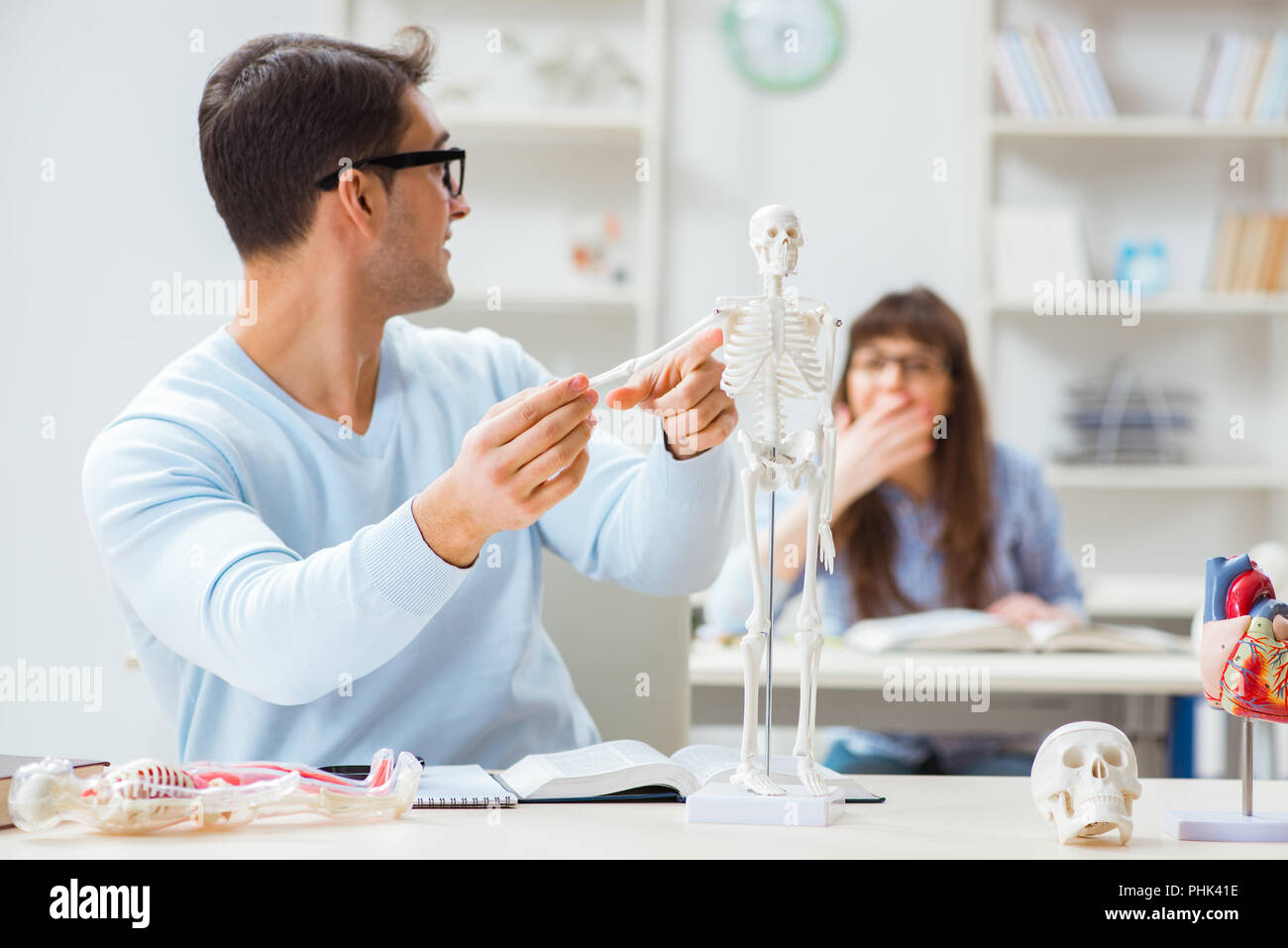 Two medical students studying in classroom Stock Photo - Alamy