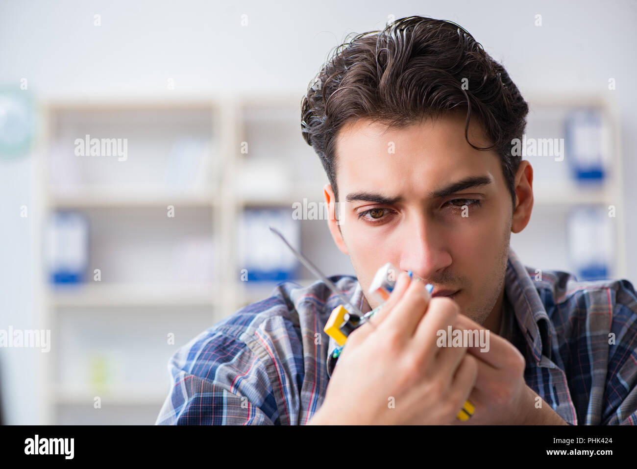 Computer hardware repair and fixing concept by experienced techn Stock ...