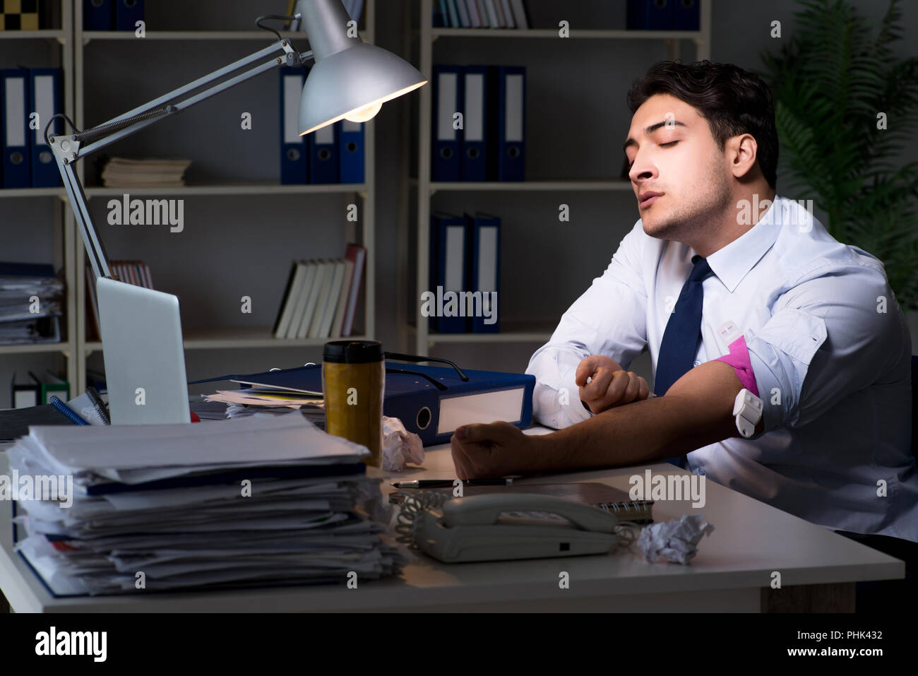 Employee relieving stress from overtime with drugs narcotics Stock ...