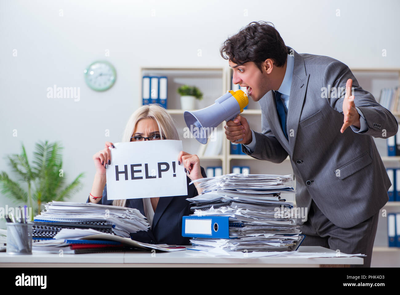 Angry boss yelling at his assistant secretary Stock Photo - Alamy