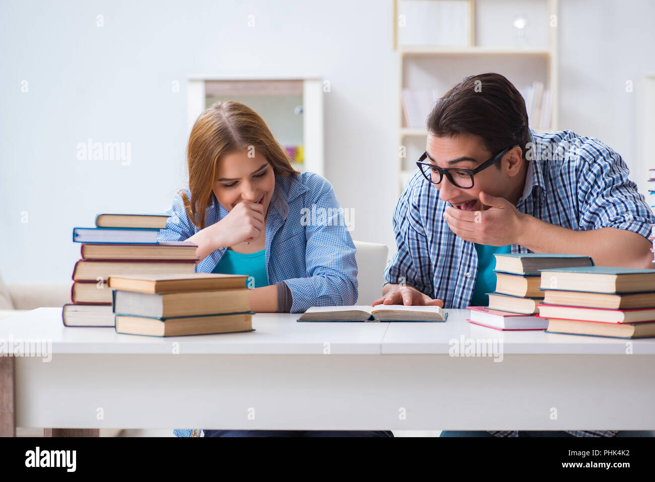 Pair of students studying for university exams Stock Photo - Alamy