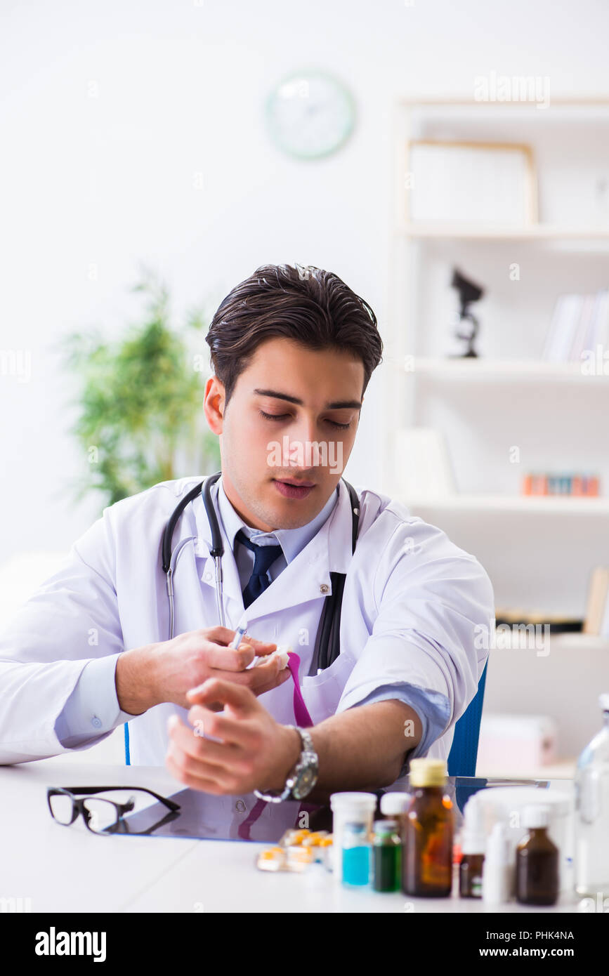 Doctor drug addict in the hospital Stock Photo - Alamy