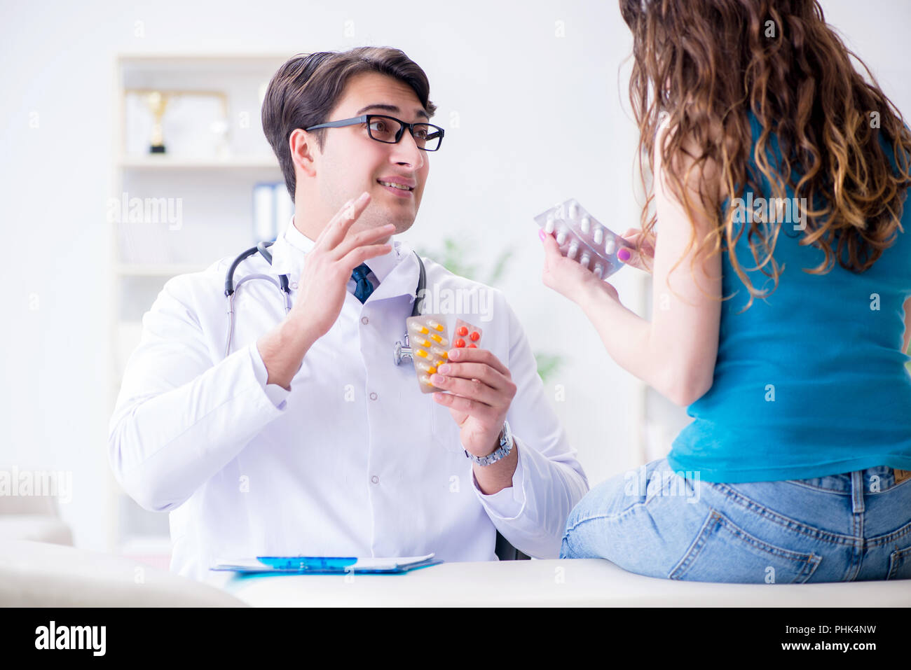 Patient visiting doctor for annual regular check-up in hospital Stock ...