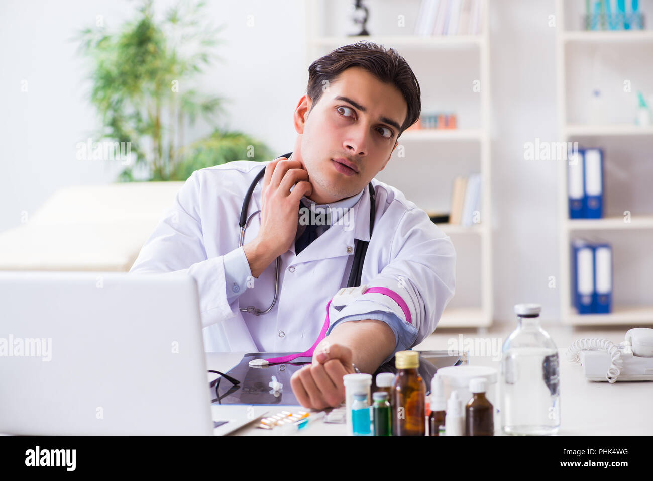 Doctor drug addict in the hospital Stock Photo - Alamy