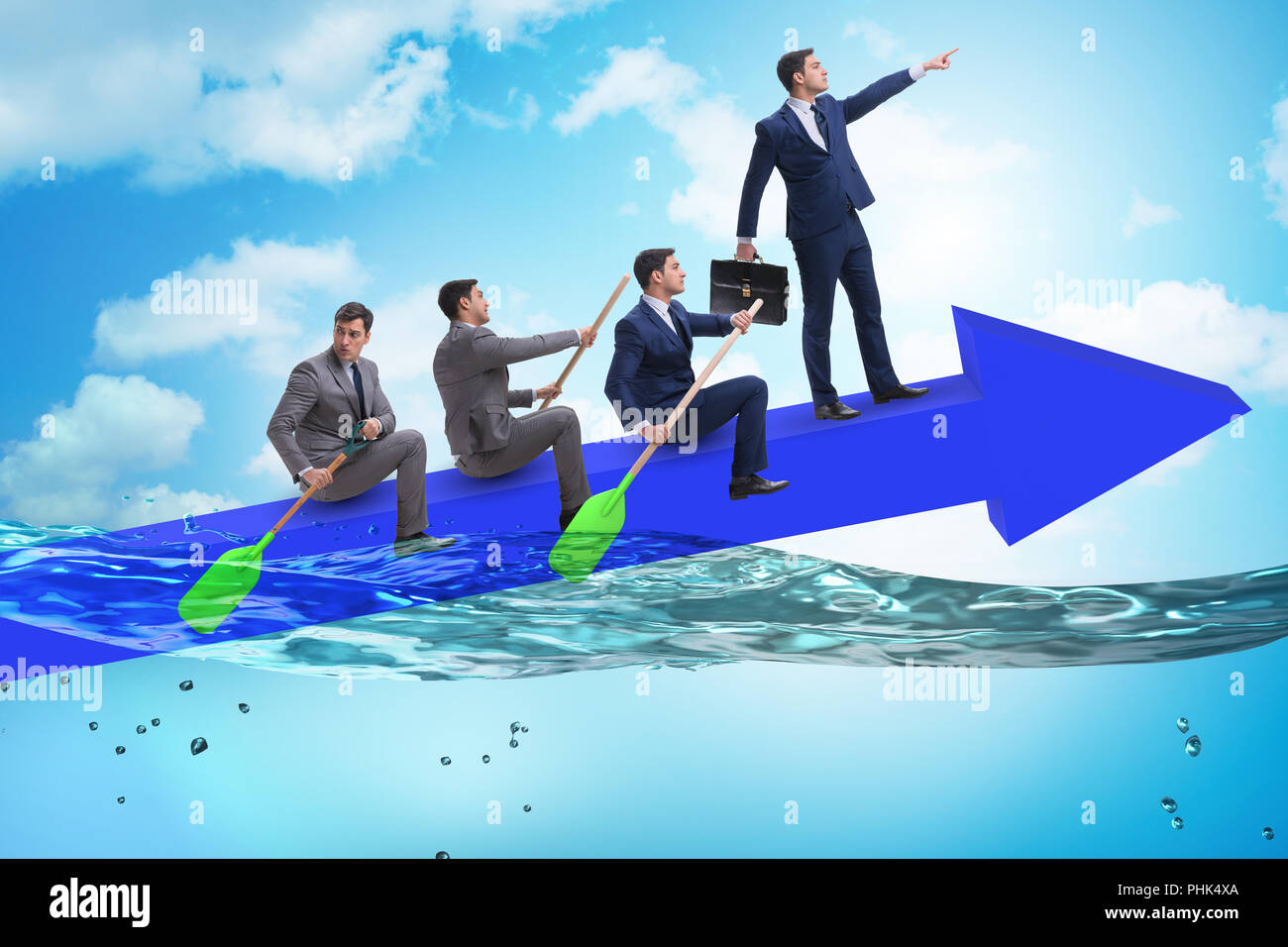 Teamwork concept with businessmen on boat Stock Photo - Alamy