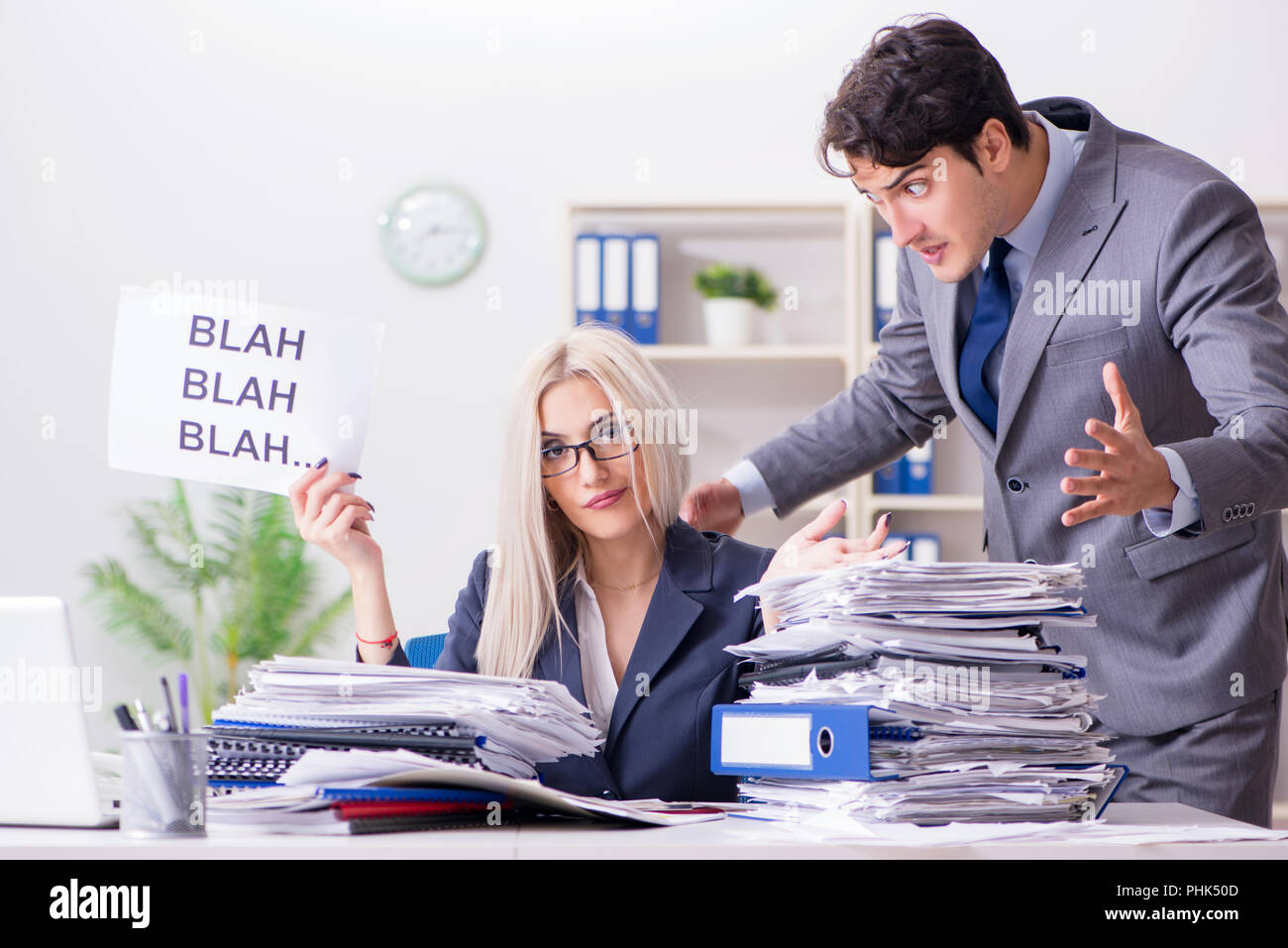 Angry boss yelling at his assistant secretary hi-res stock photography ...