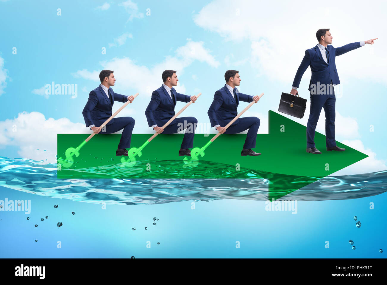 Teamwork concept with businessmen on boat Stock Photo - Alamy