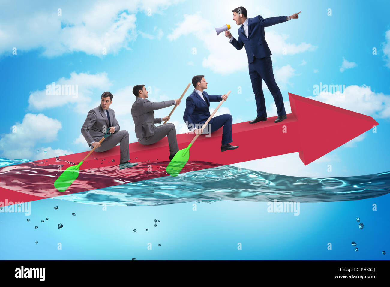 Teamwork concept with businessmen on boat Stock Photo - Alamy