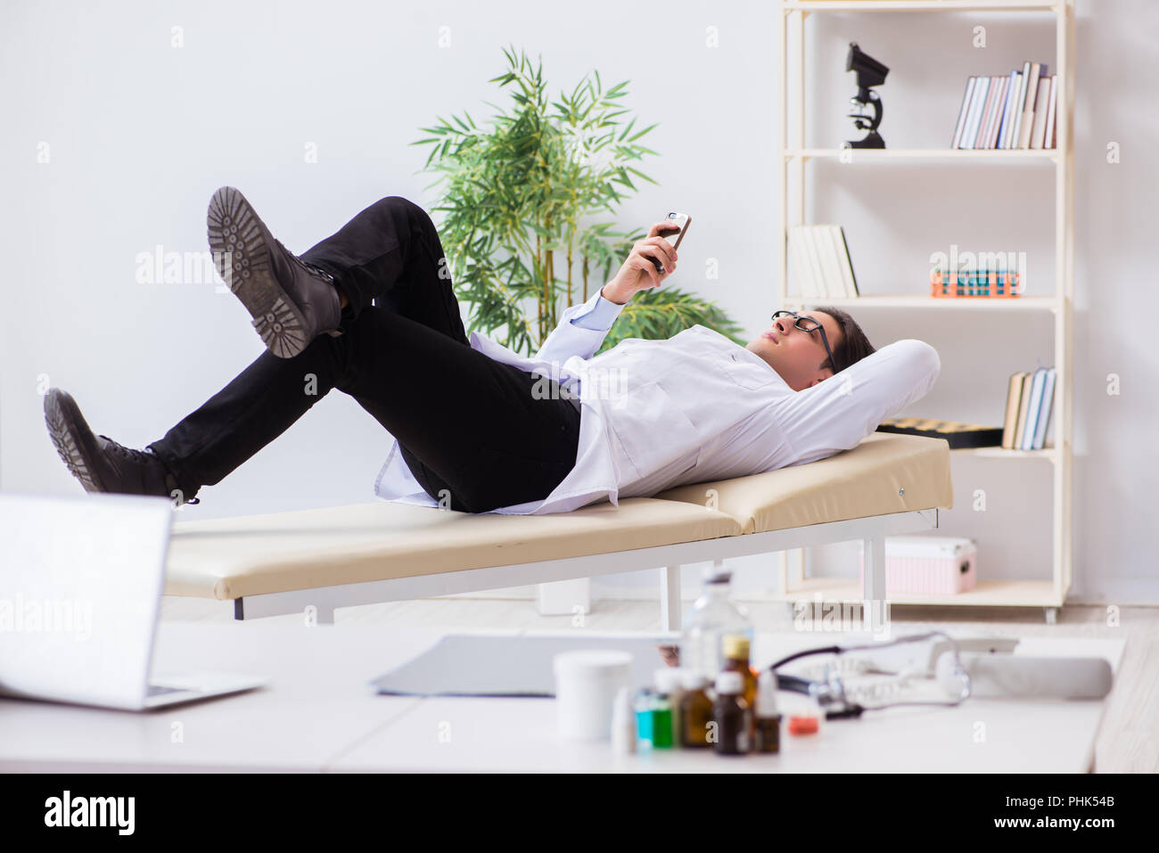 Doctor relaxing after complex surgery in hospital Stock Photo - Alamy