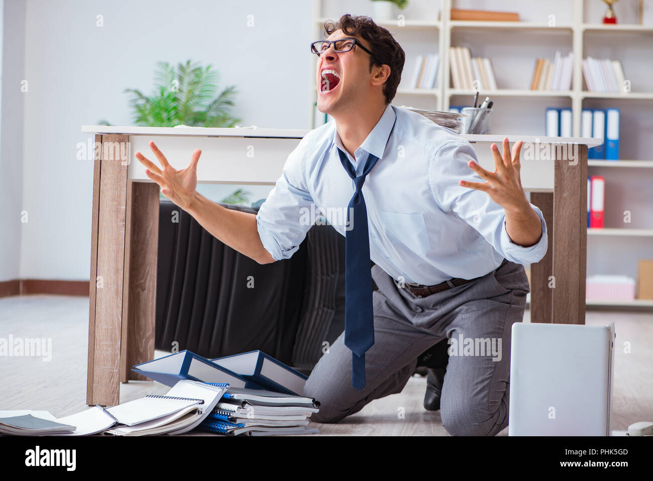 Bankrupt businessman angry in the office floor Stock Photo - Alamy