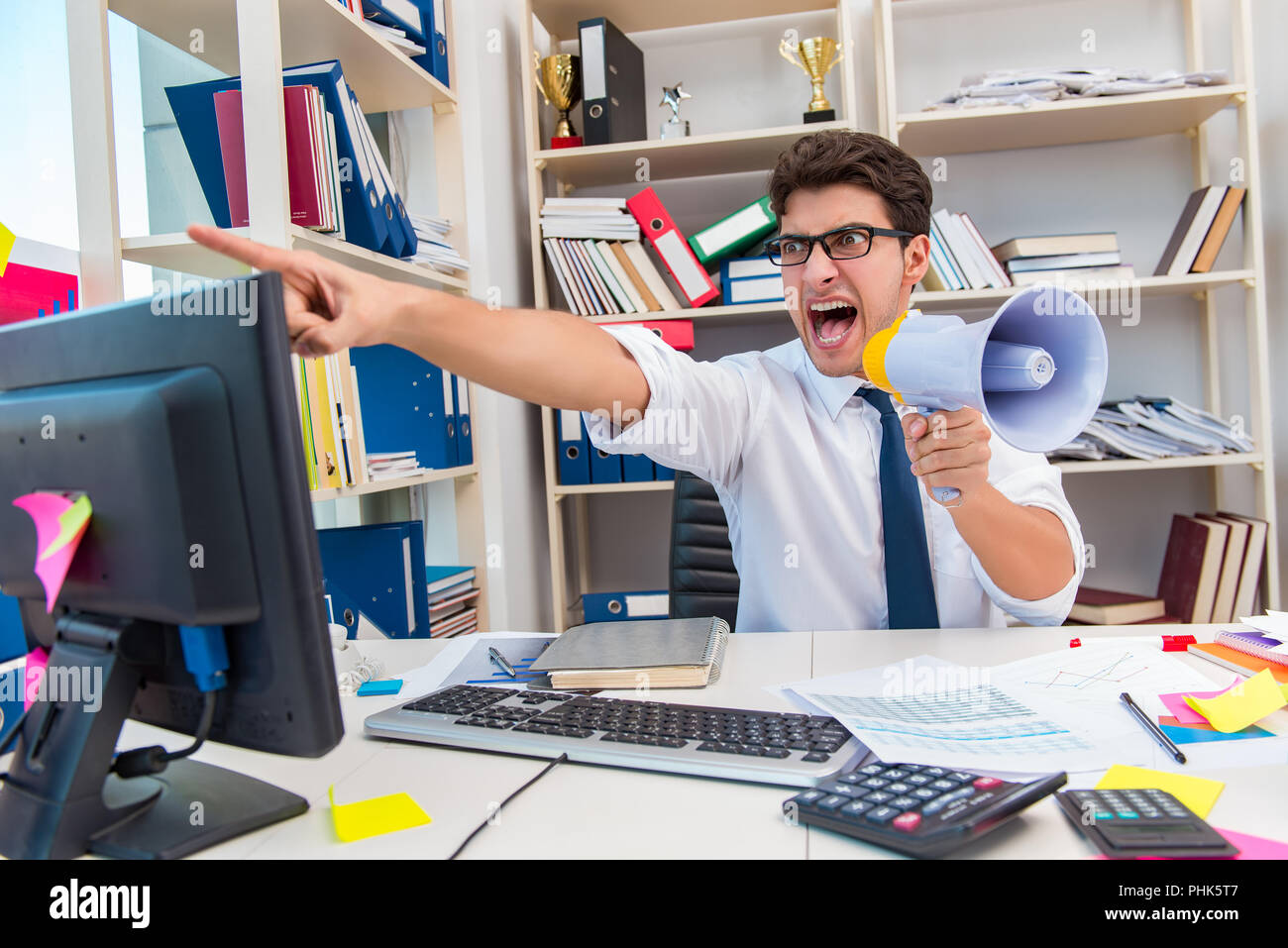 Busy frustrated businessman angry in the office Stock Photo - Alamy