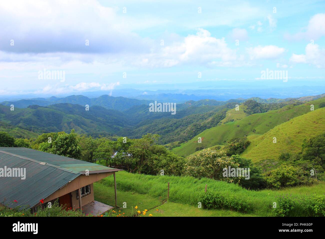 A beautiful long-distance view over the green lush and mountainus ...