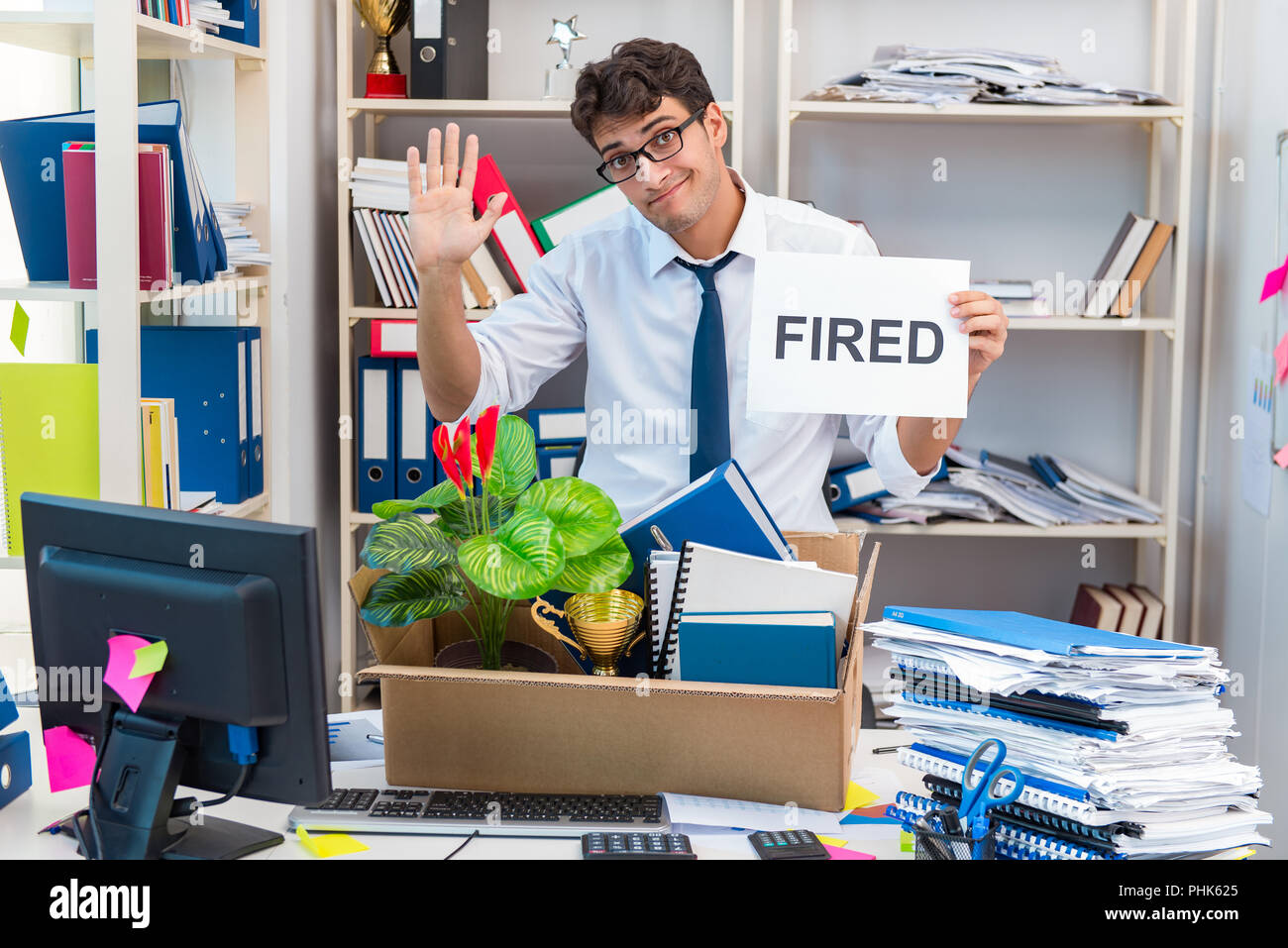 Employee being fired from work made redundant Stock Photo - Alamy