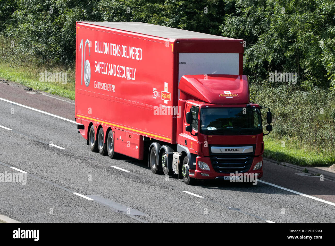 Heavy goods lorries logistics transport vehicles on the M6 at Lancaster ...