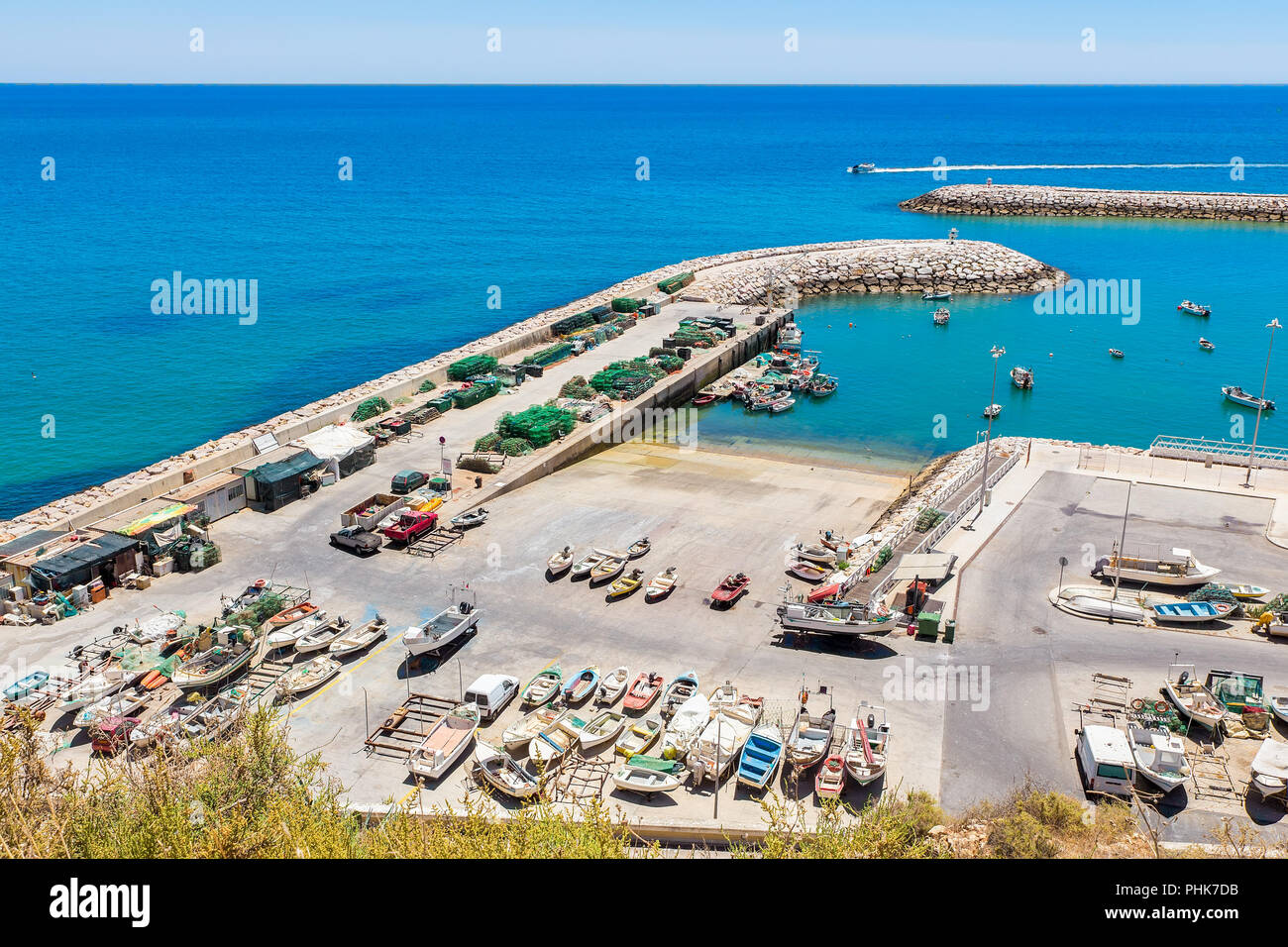 Fleet of boats in Portuguese harbor Stock Photo - Alamy