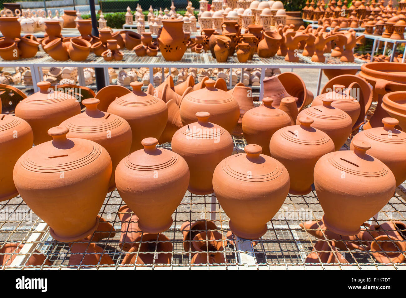 Many orange clay pots outside at pottery Stock Photo - Alamy