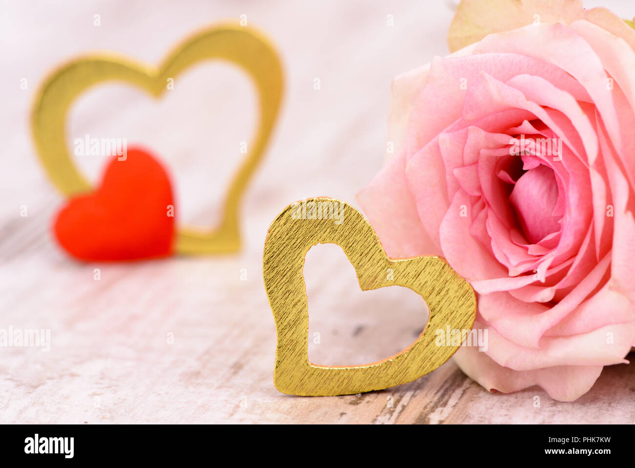 rose flower with heart as symbol for love Stock Photo - Alamy
