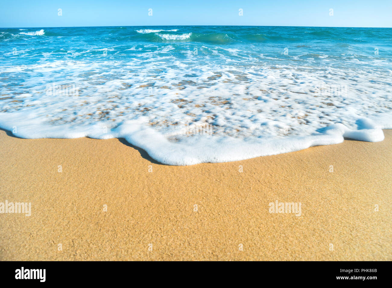 Tropical beach with sand and sea Stock Photo - Alamy