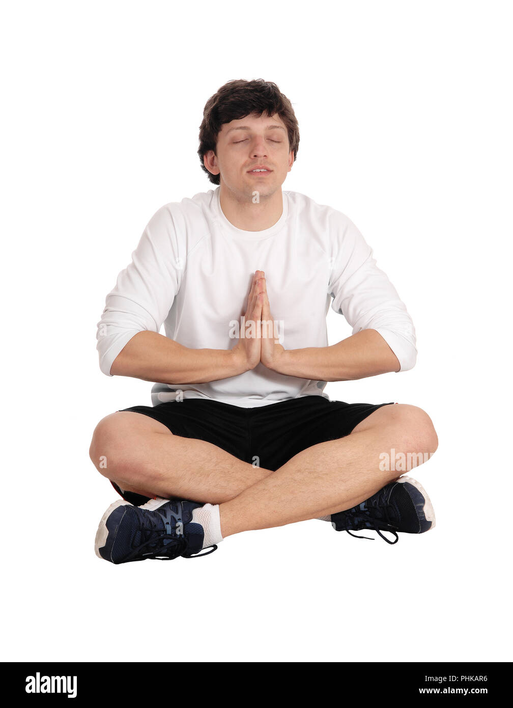 One handsome man meditating hi-res stock photography and images - Alamy
