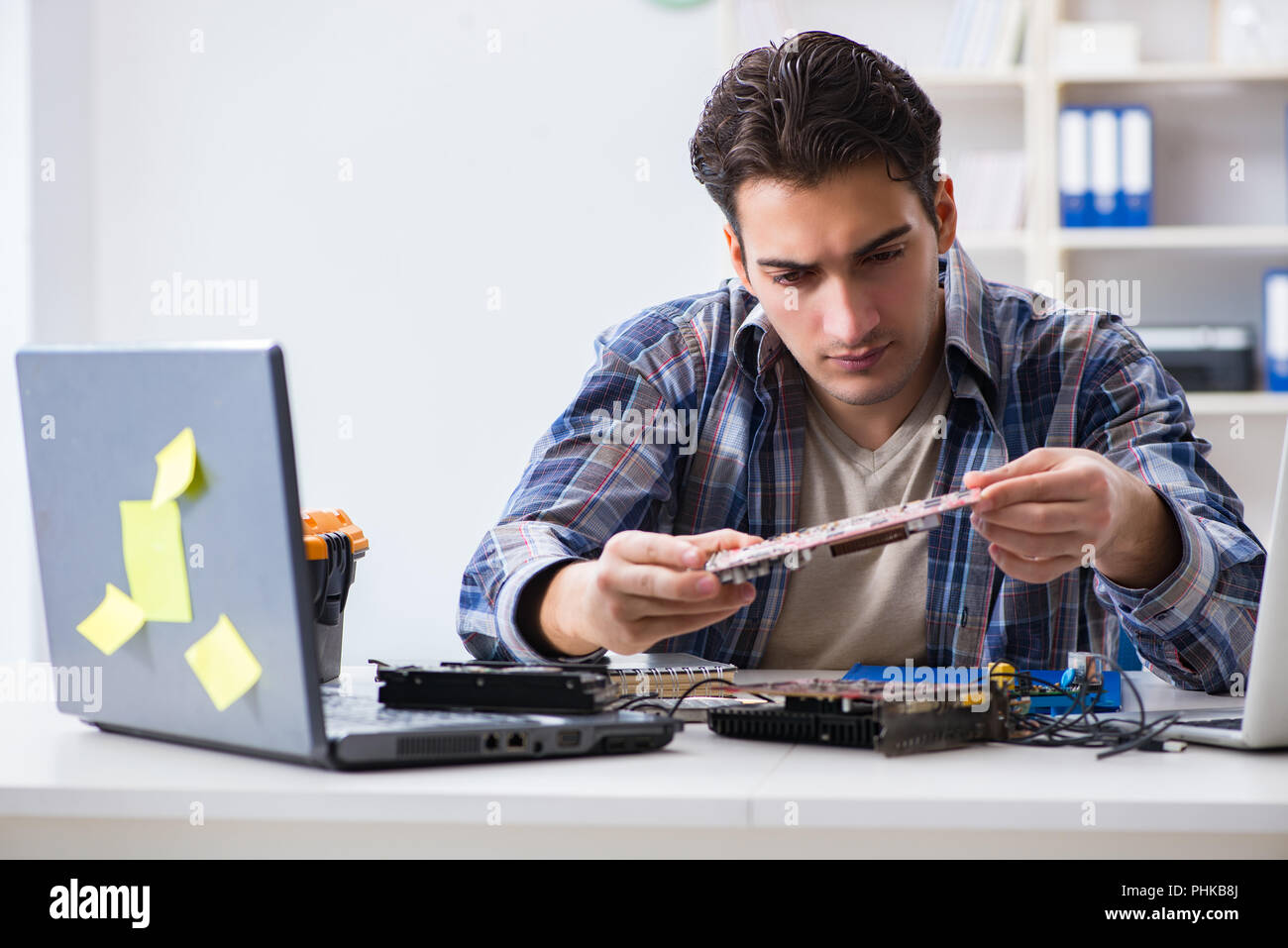 Computer hardware repair and fixing concept by experienced techn Stock ...