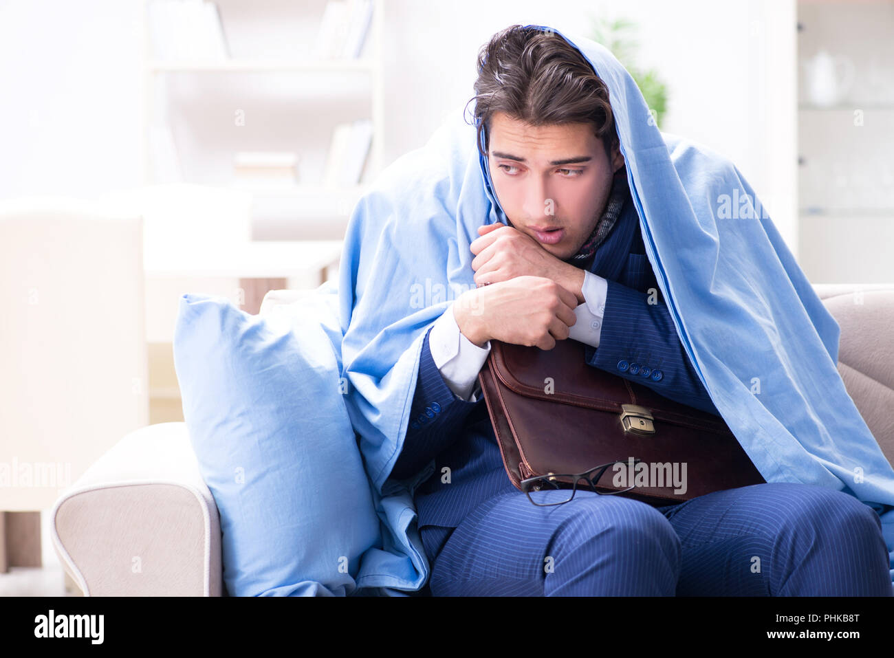 Sick employee staying at home suffering from flue Stock Photo - Alamy