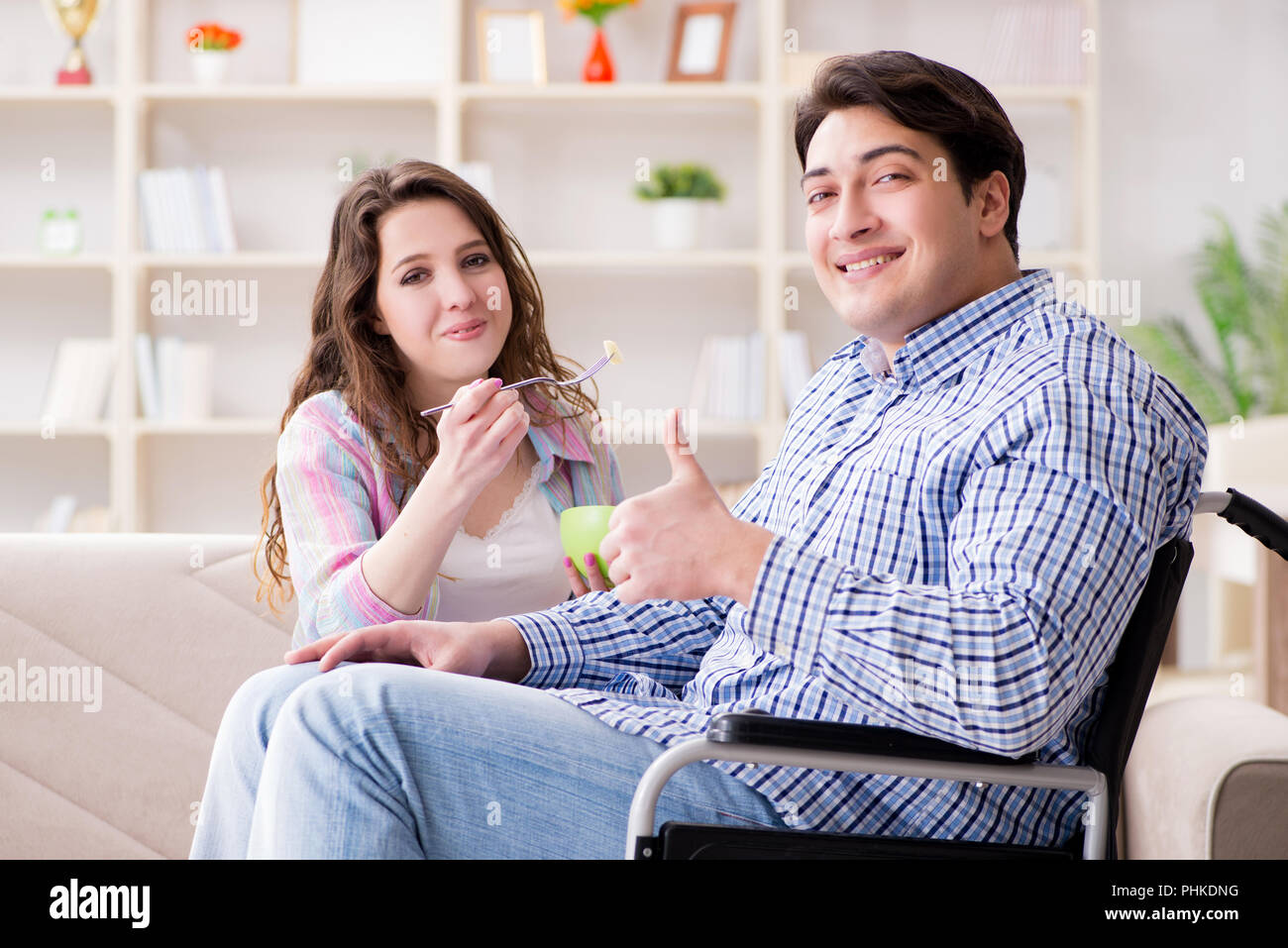 Cheerful family supporting sick hi-res stock photography and images - Alamy