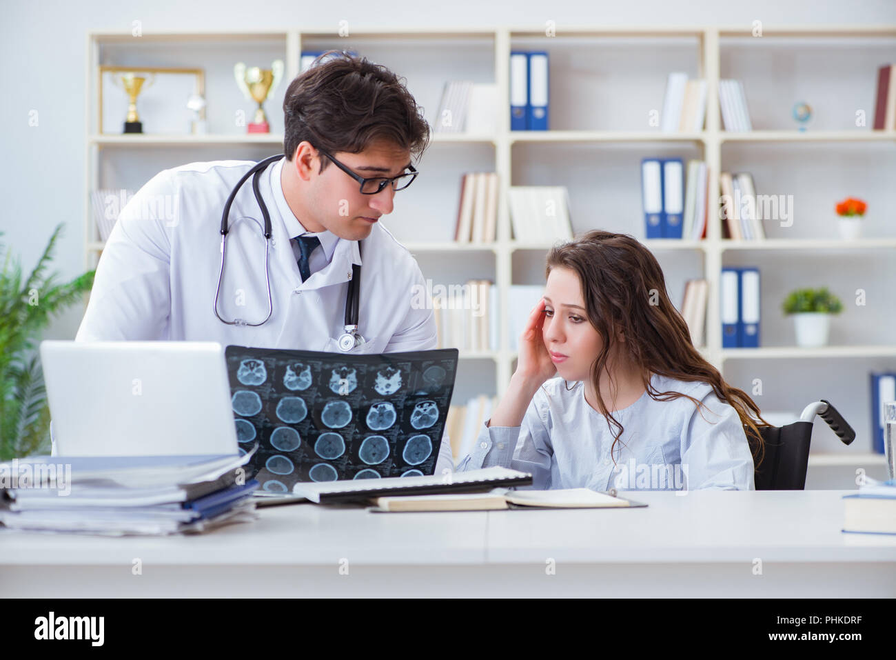 Doctor feeling pessimistic about x-ray image of patient Stock Photo - Alamy