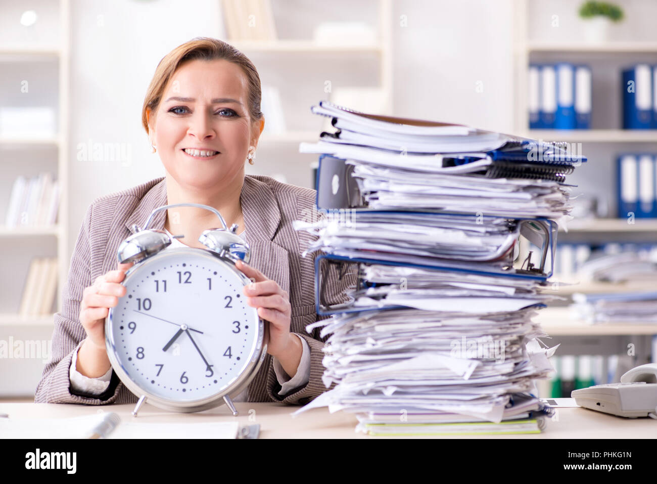 Business woman trying finish work hi-res stock photography and images ...