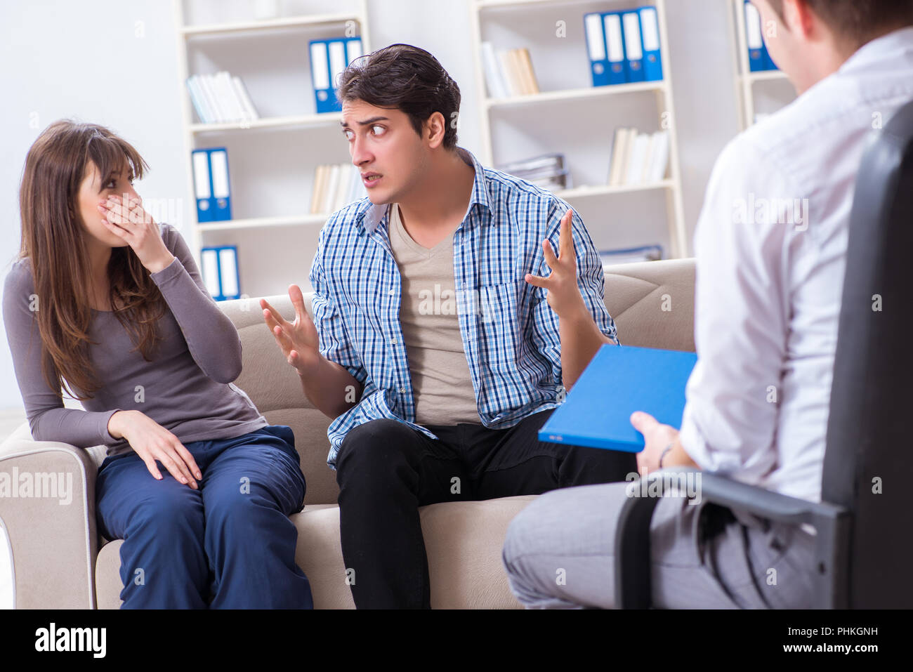 Family visiting psychologist for family problem Stock Photo - Alamy