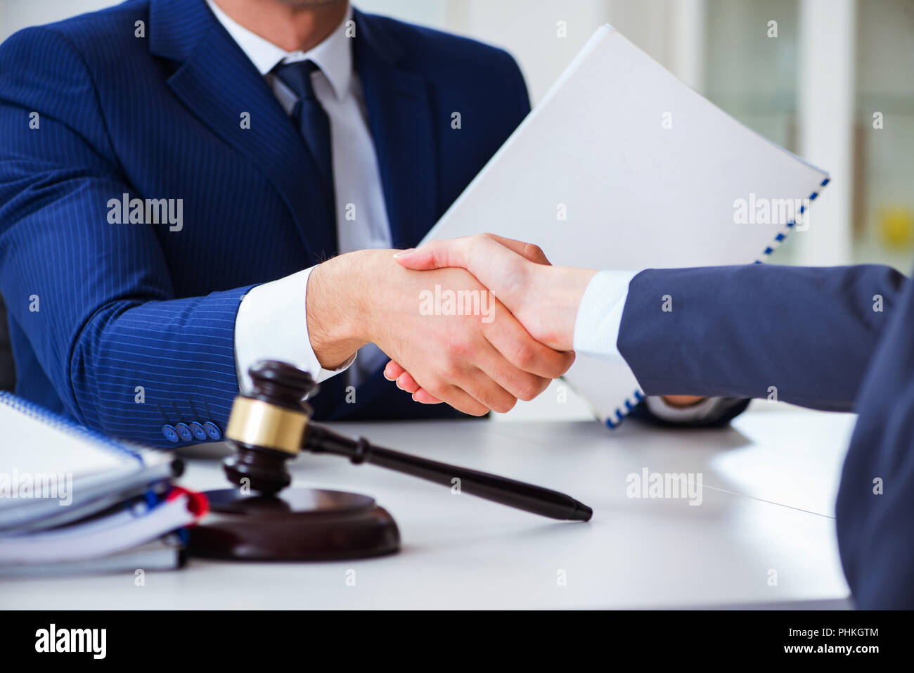 Lawyer talking to his client in office Stock Photo - Alamy